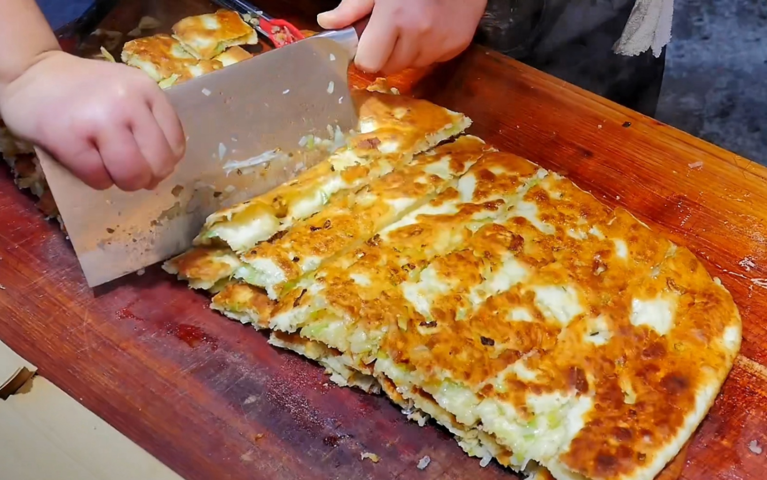 Village-style scallion flatbread: 9 yuan per jin. Freshly cooked, the ...